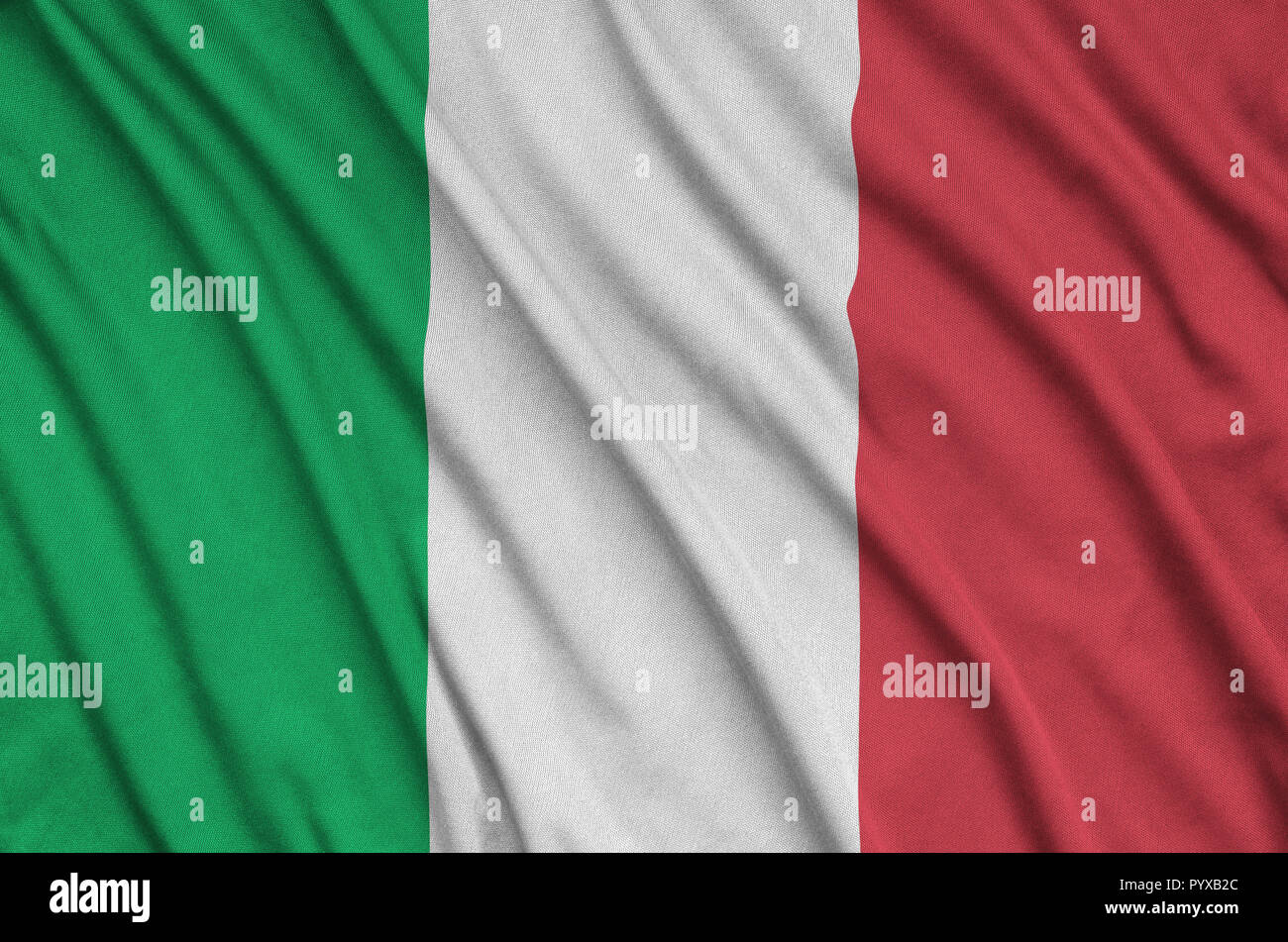 Italy flag is depicted on a sports cloth fabric with many folds. Sport ...