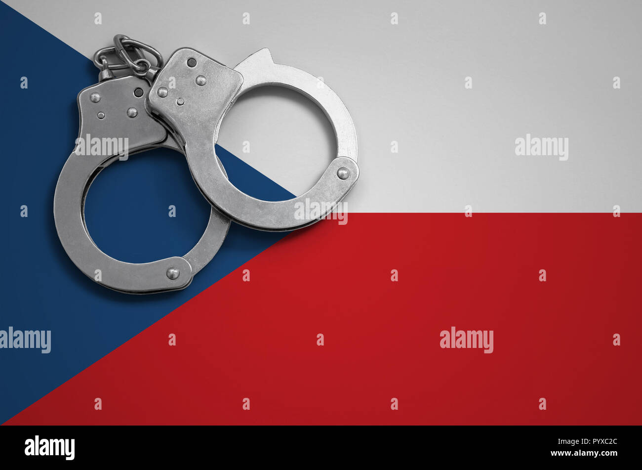 Czech flag and police handcuffs. The concept of crime and offenses in ...