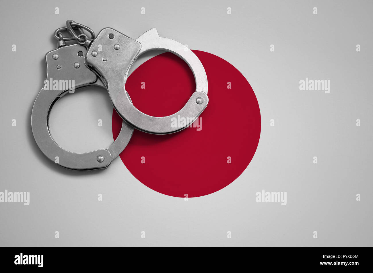 Japan police handcuffs hi-res stock photography and images - Alamy