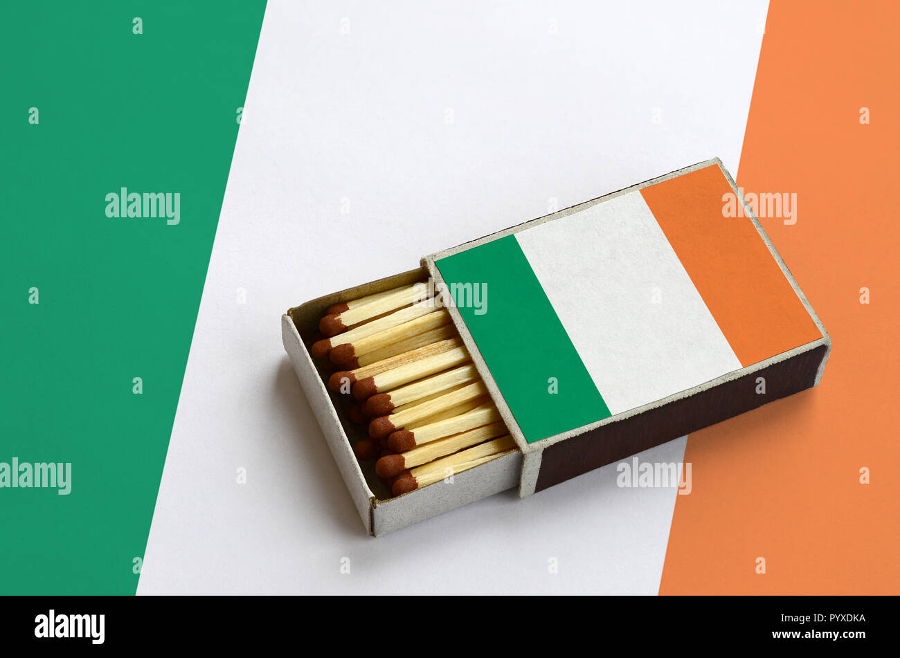 Ireland flag is shown in an open matchbox, which is filled with matches ...