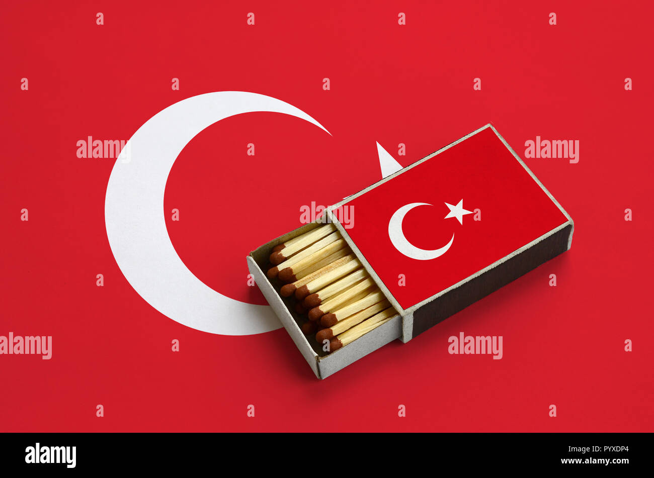 Turkey flag is shown in an open matchbox, which is filled with matches ...