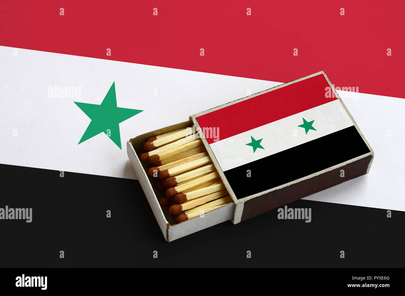 Syria flag is shown on an open matchbox hi-res stock photography and ...