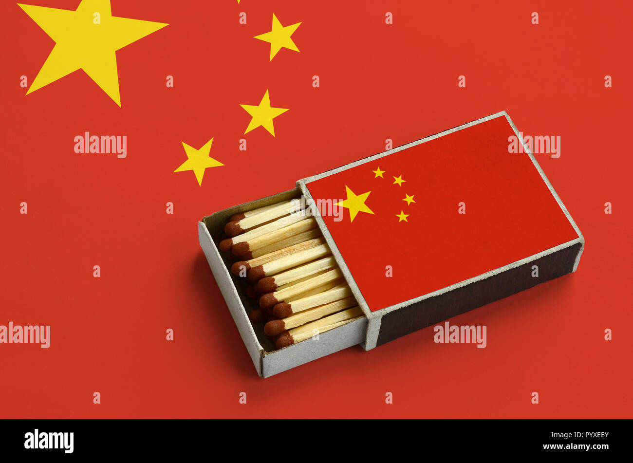 China flag is shown in an open matchbox, which is filled with matches ...