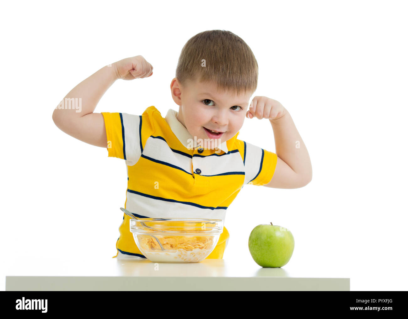 child boy eating healthy food and showing his strength, isolated on ...