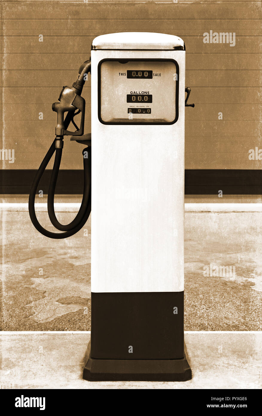 vintage gasoline station gas pump in the setting of an old gas station ...