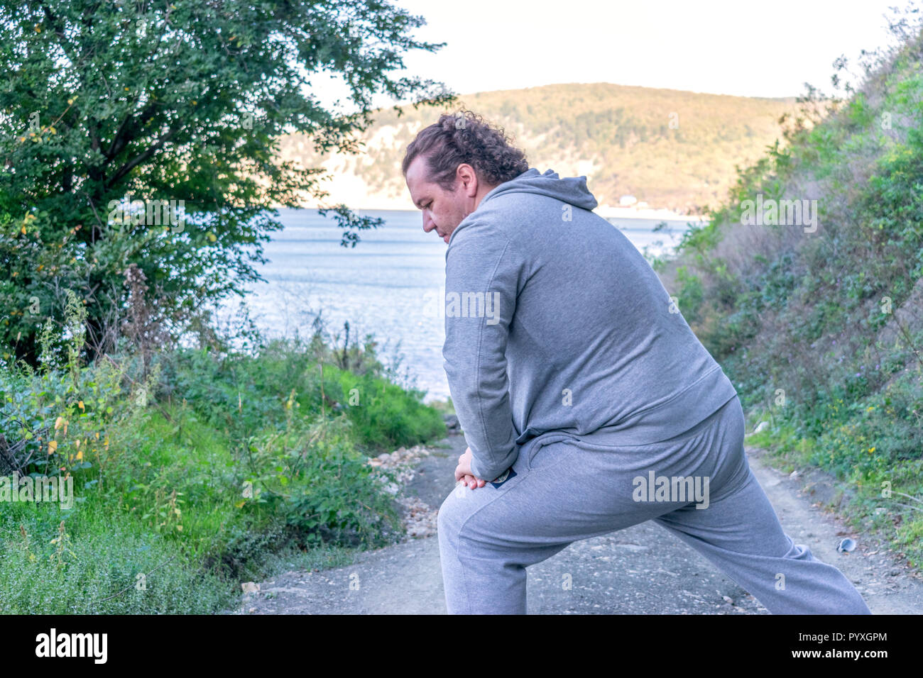 Fat man in landscape hi-res stock photography and images - Alamy