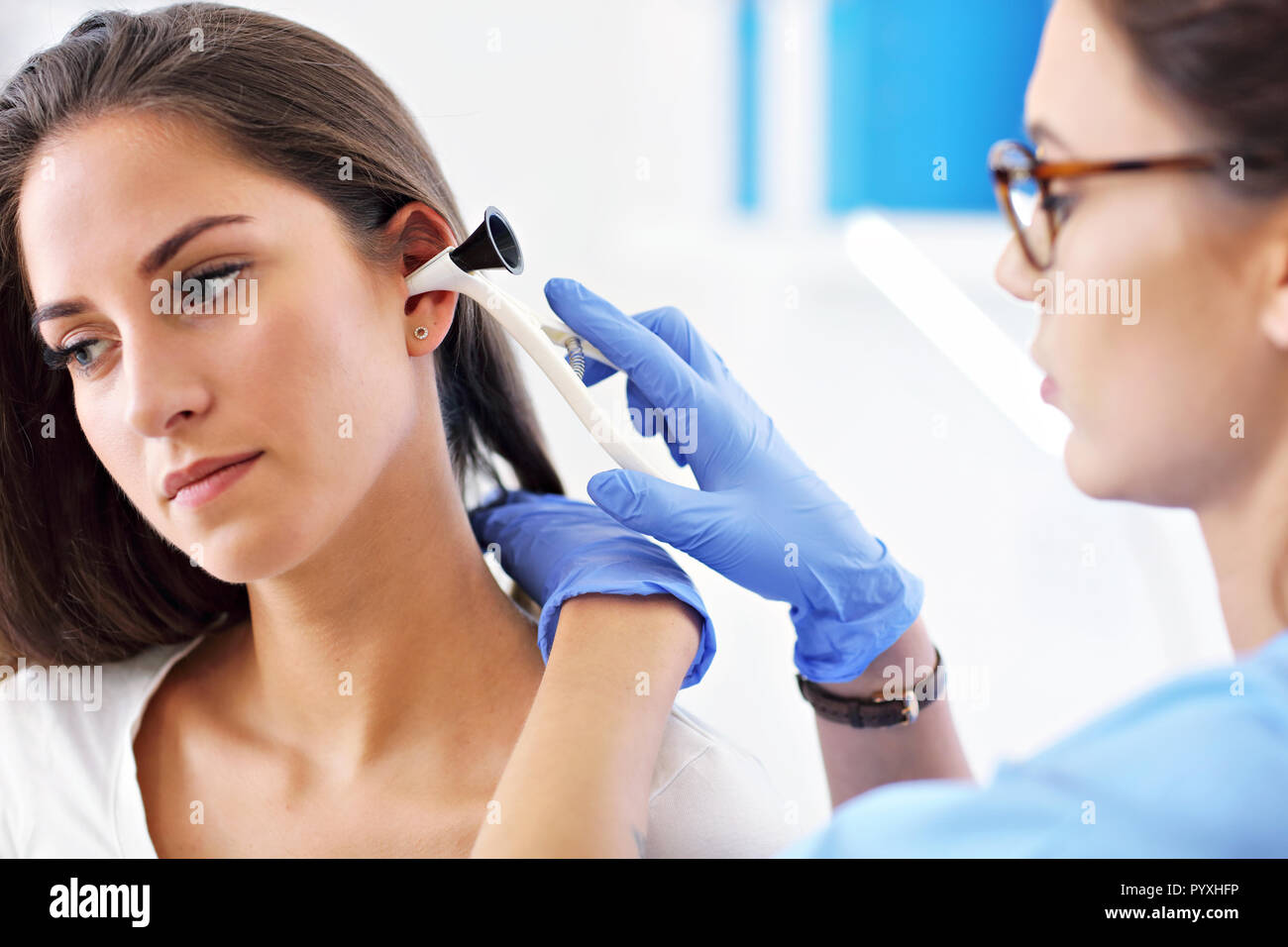 Picture of adult woman having a visit at female doctor's office Stock ...