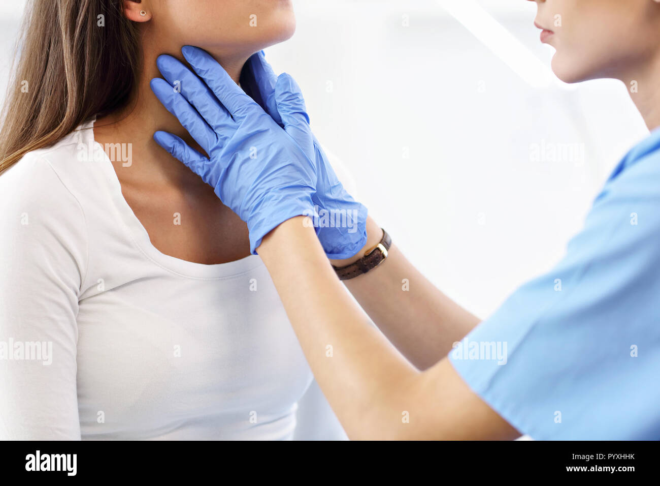 Picture of adult woman having a visit at female doctor's office Stock ...