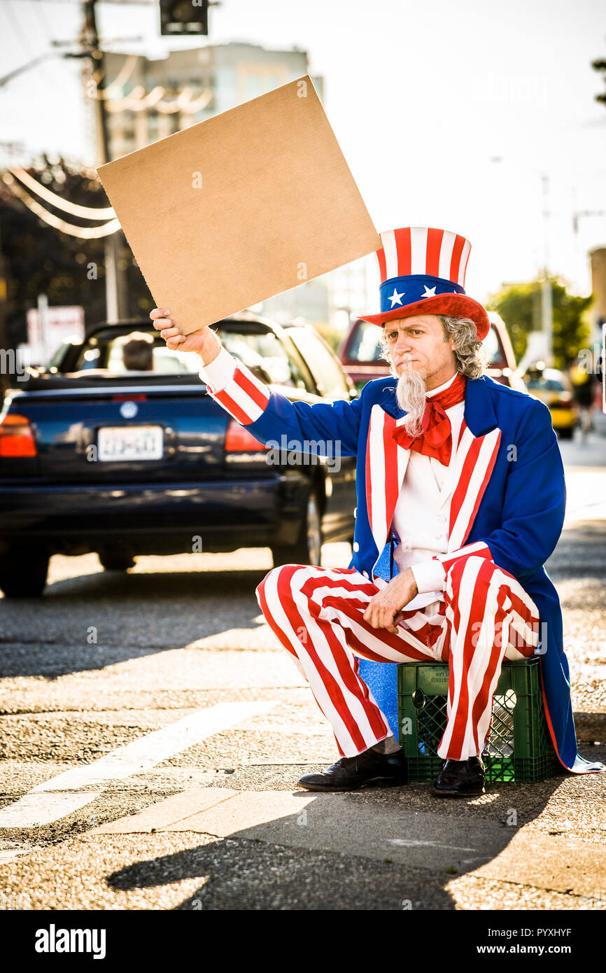 An Uncle Sam character with a blank sign as if he is panhandling. Add ...