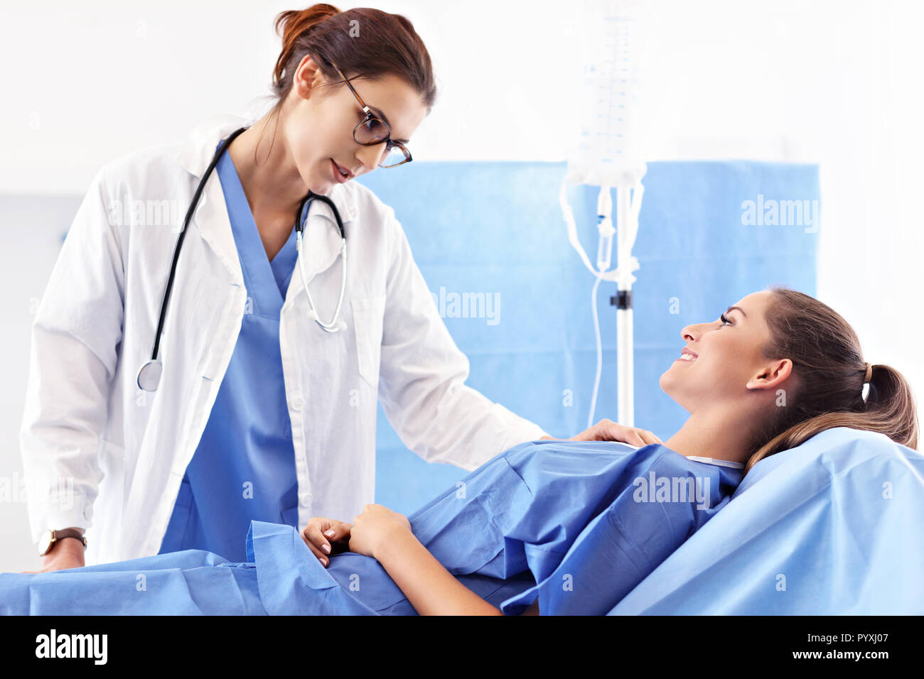 Picture of adult woman having a conversation with doctor in hospital ...