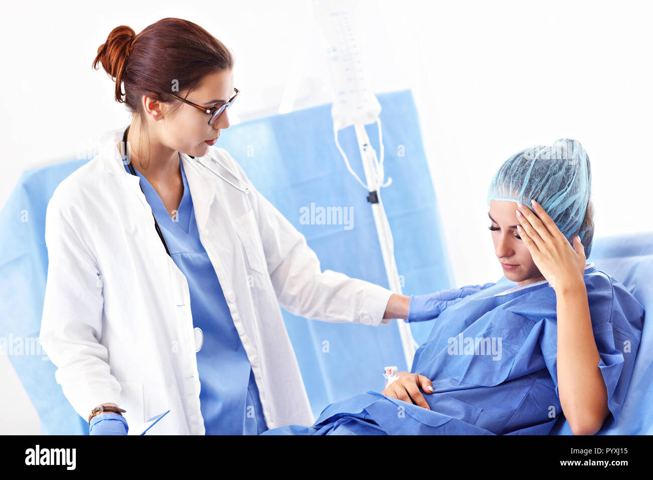 Picture of adult woman having a conversation with doctor in hospital ...