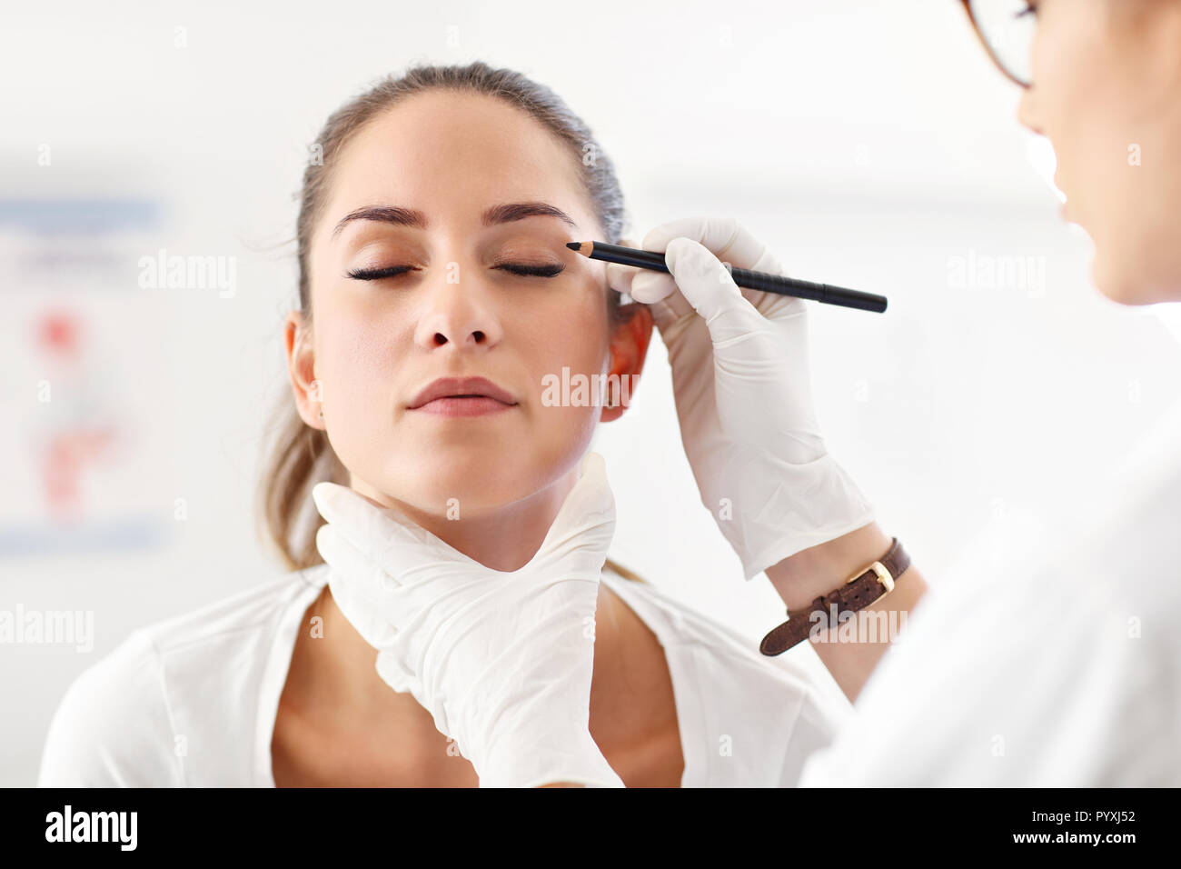 Picture of plastic plastic surgeon making marks on patient's body Stock ...