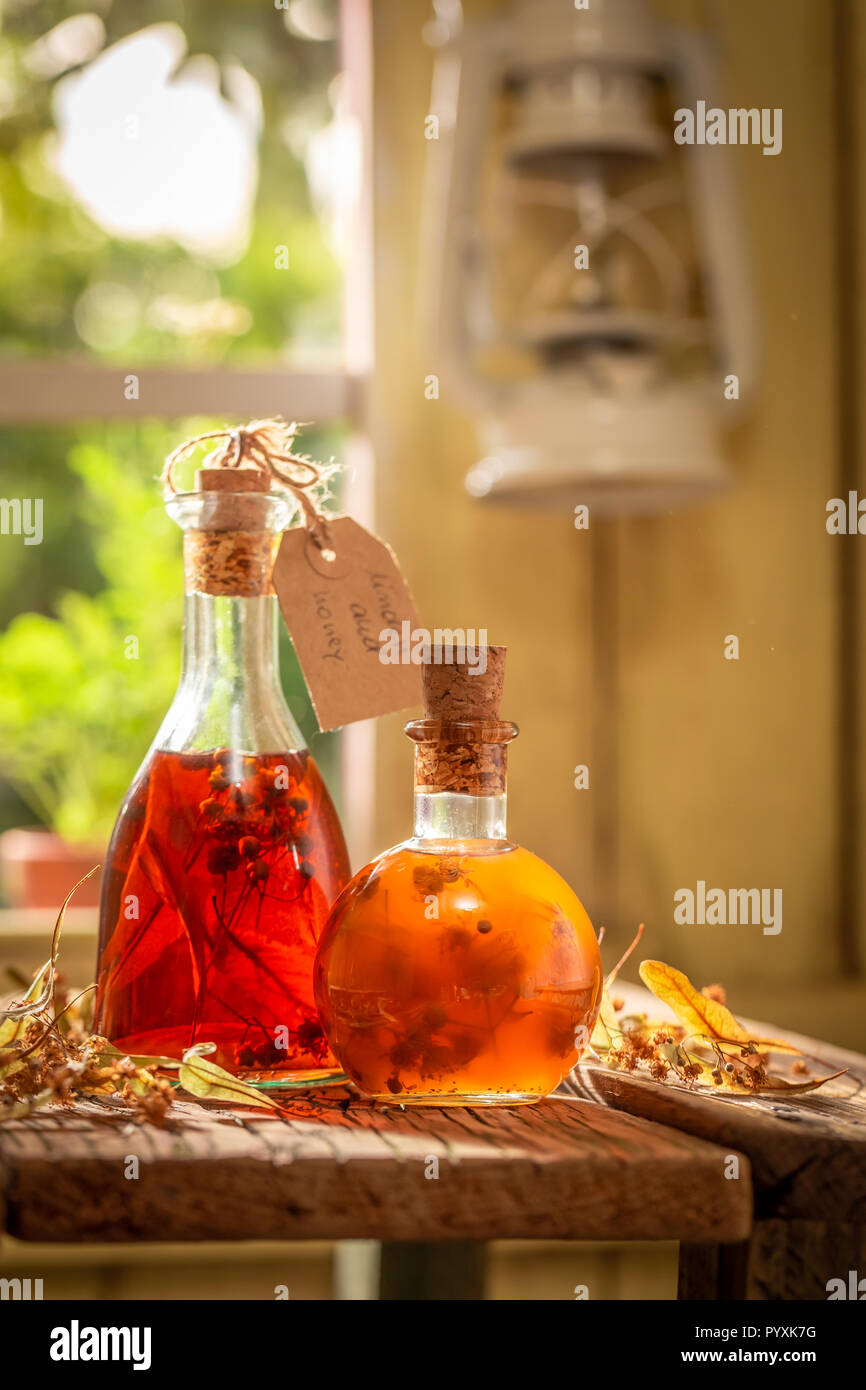 Homemade quince tincture made of honey and linden Stock Photo - Alamy