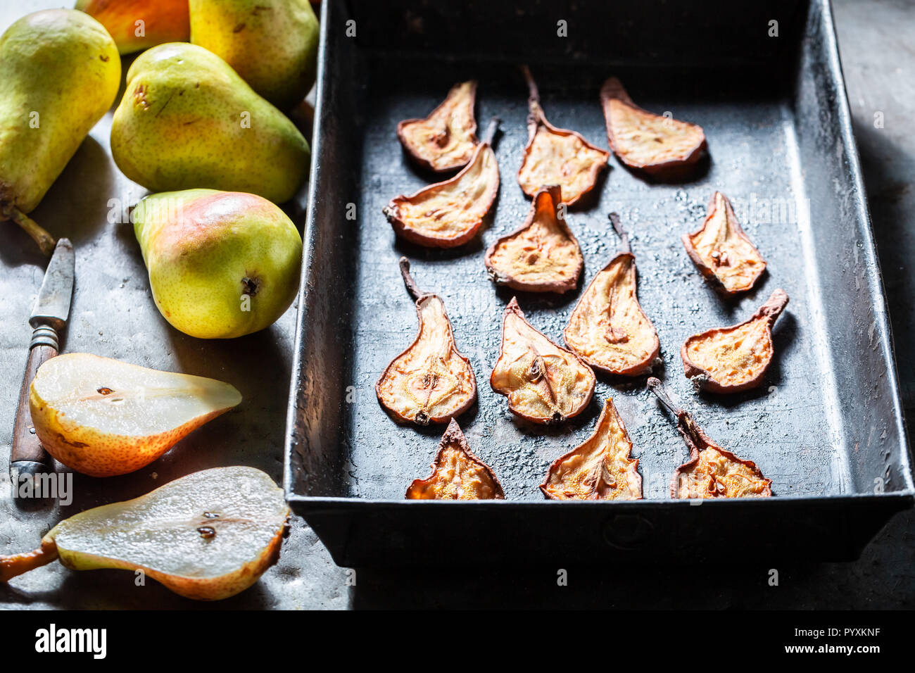 Enjoy your sun dried pears as a sweet snack Stock Photo - Alamy