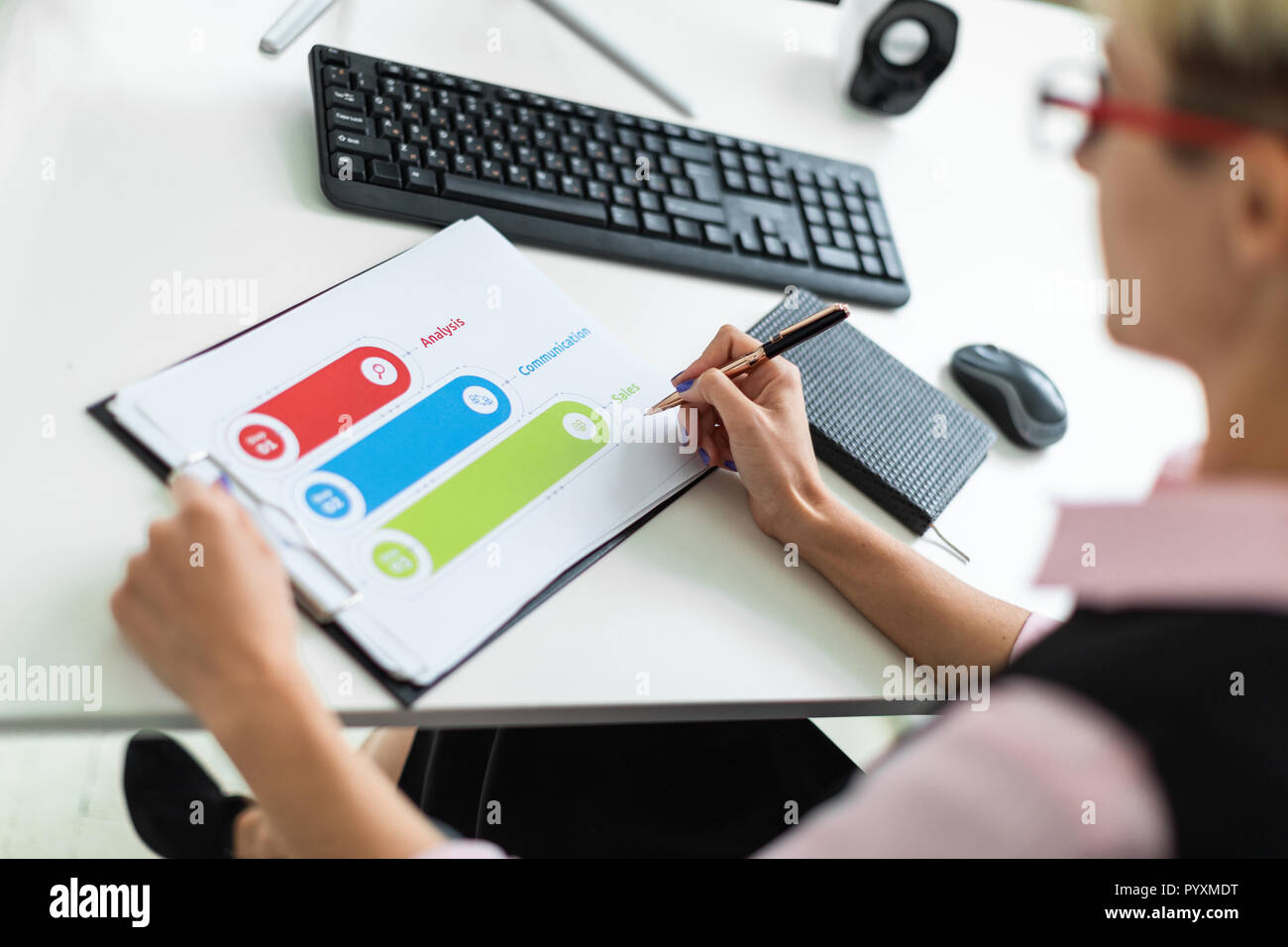Young girl fills out documents Stock Photo - Alamy