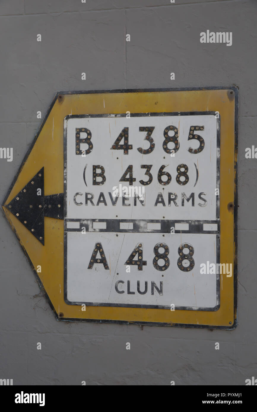 Old road sign B4385 and A488 to Clun Stock Photo - Alamy
