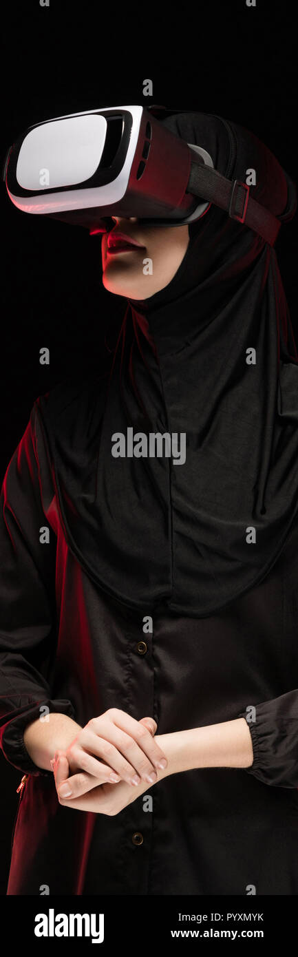 Portrait of beautiful smart young muslim woman wearing black hijab ...