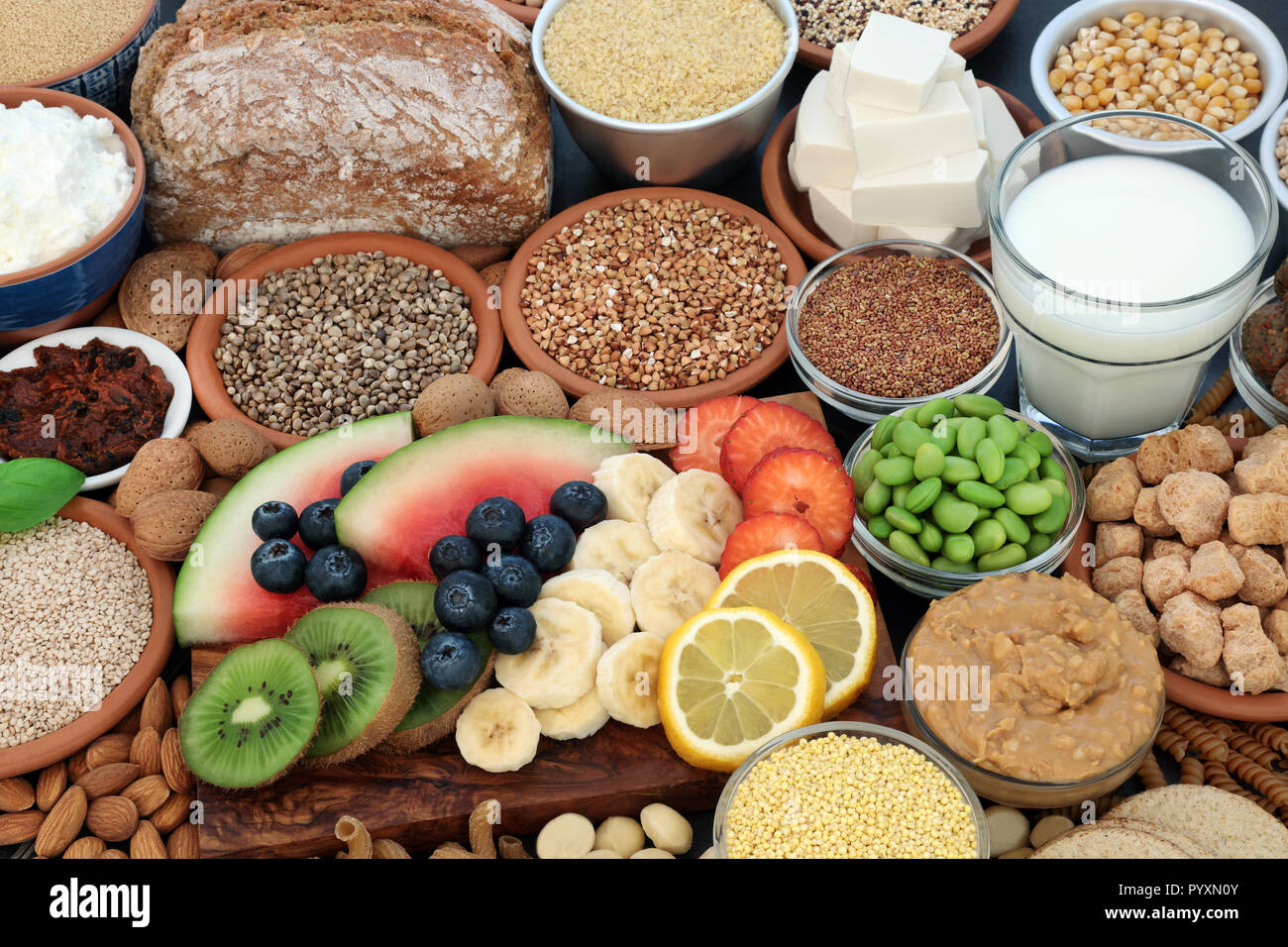 Health food for vegans with almond butter, yoghurt & milk, tofu bean ...