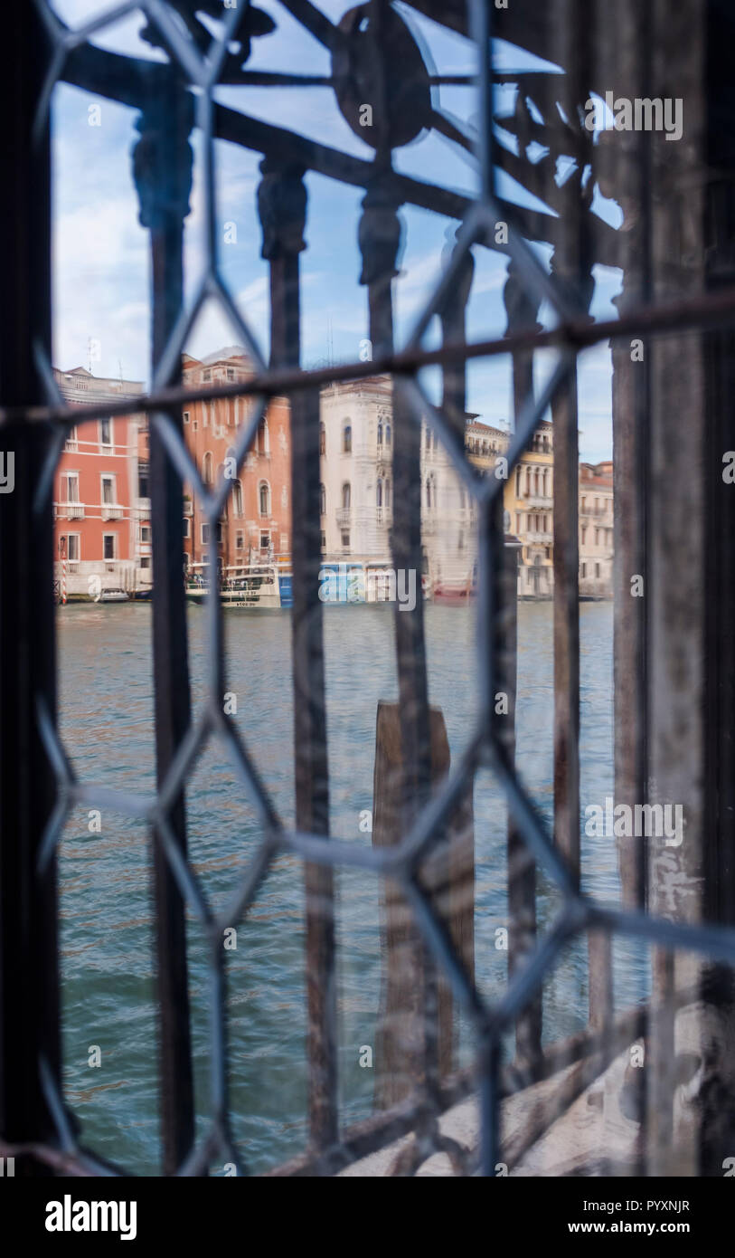 The Grand Canal of Venice, Italy, reflected in the window glass of a ...