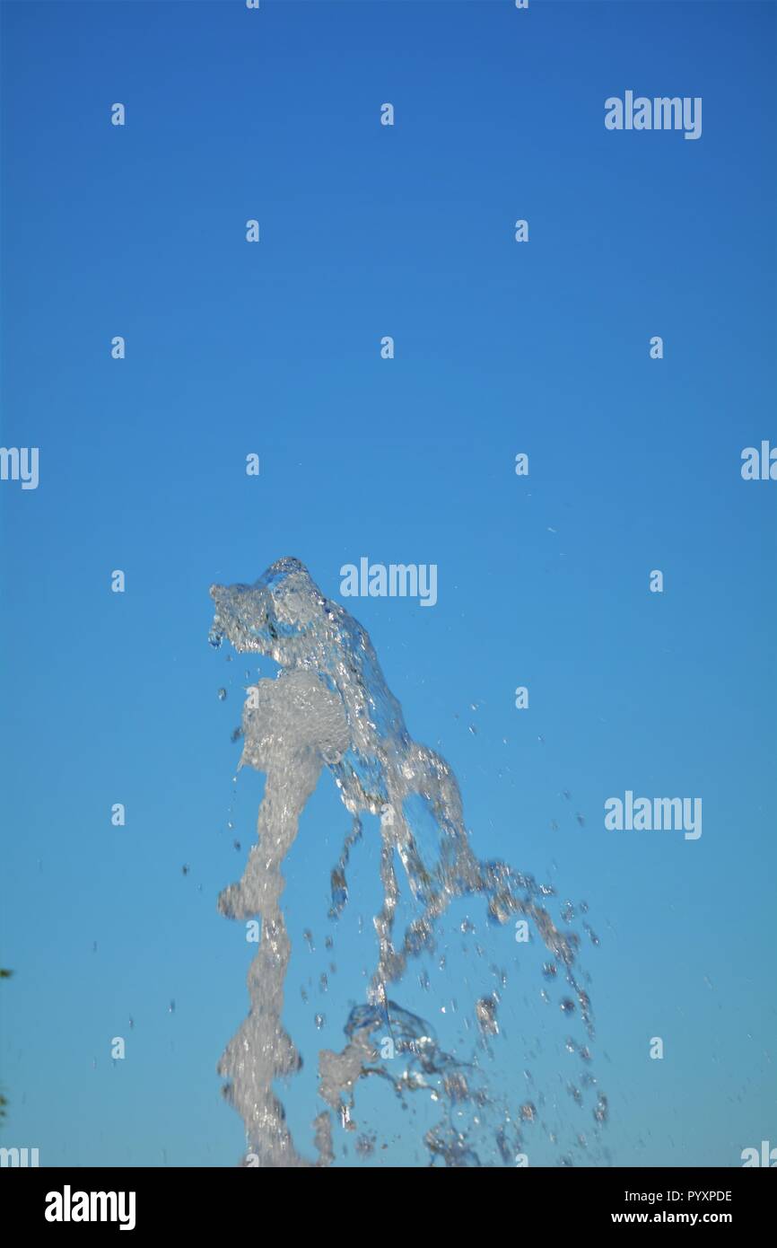 abstract water shapes from fountain Stock Photo - Alamy