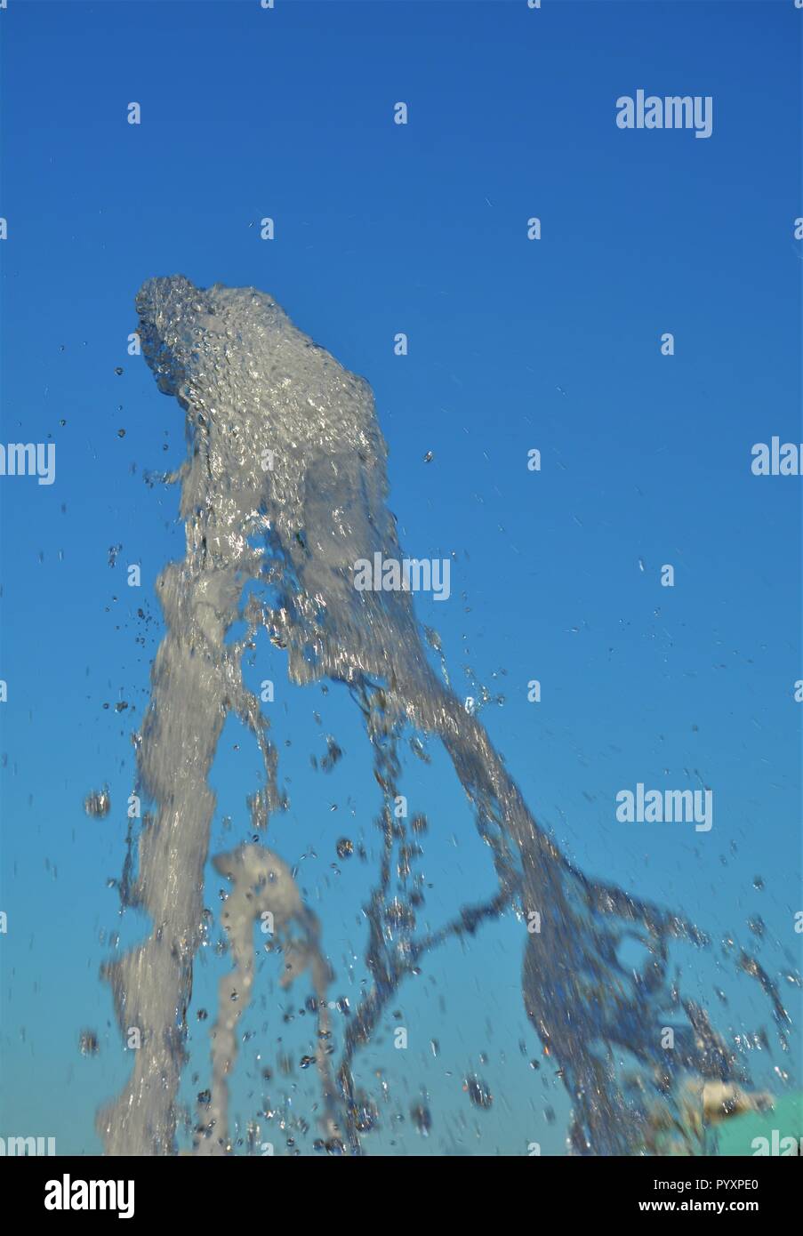 abstract water shapes from fountain Stock Photo - Alamy