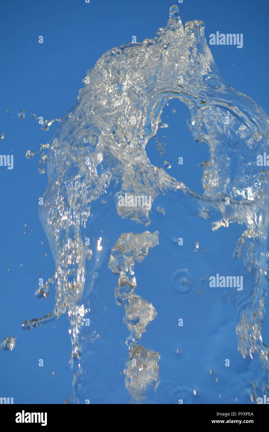 abstract water shapes from fountain Stock Photo - Alamy