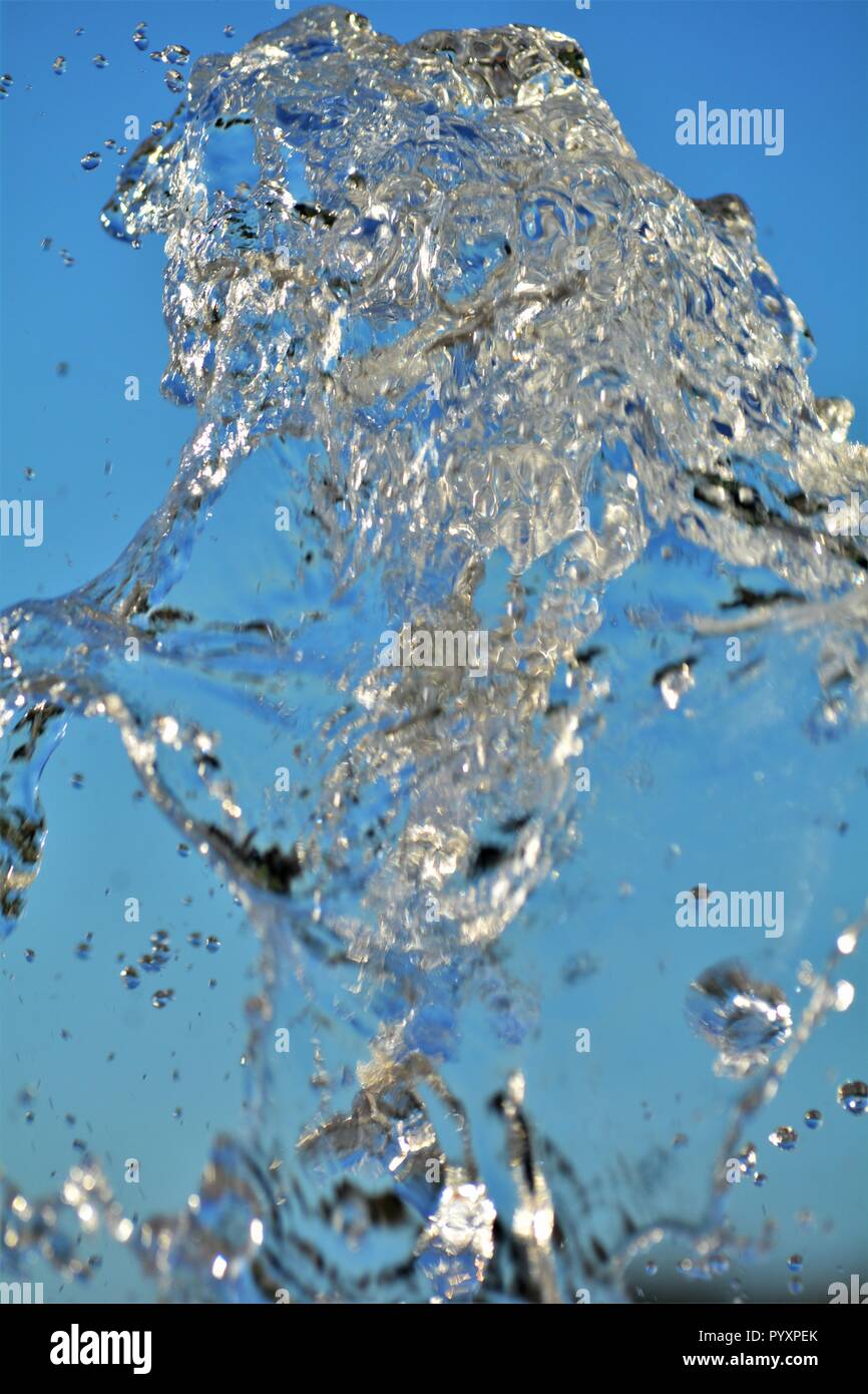 abstract water shapes from fountain Stock Photo - Alamy