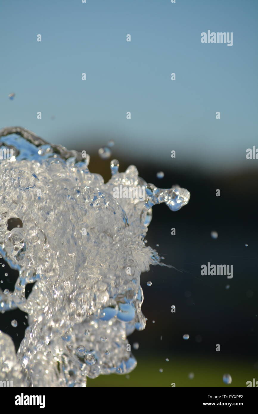 abstract water shapes from fountain Stock Photo - Alamy
