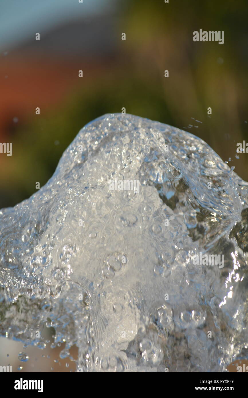 abstract water shapes from fountain Stock Photo - Alamy