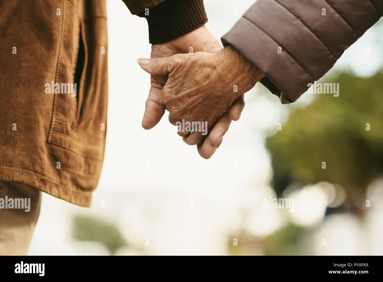 Rear view woman holding hands man hi-res stock photography and images ...