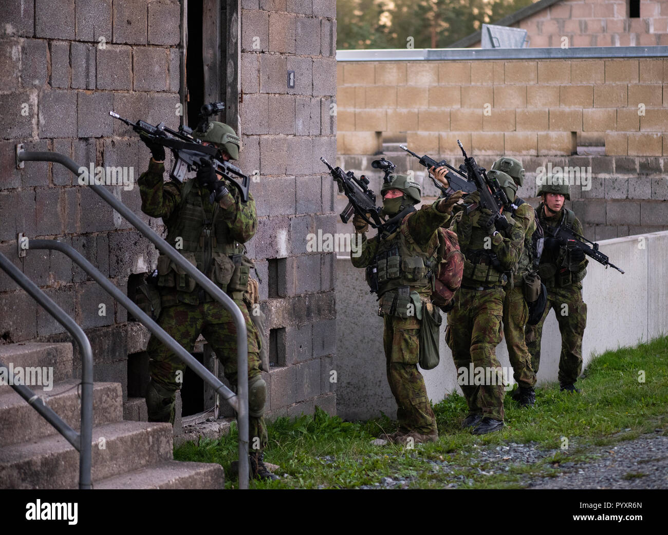 Lithuanian National Defence Volunteer Forces (KASP) soldiers assault a ...