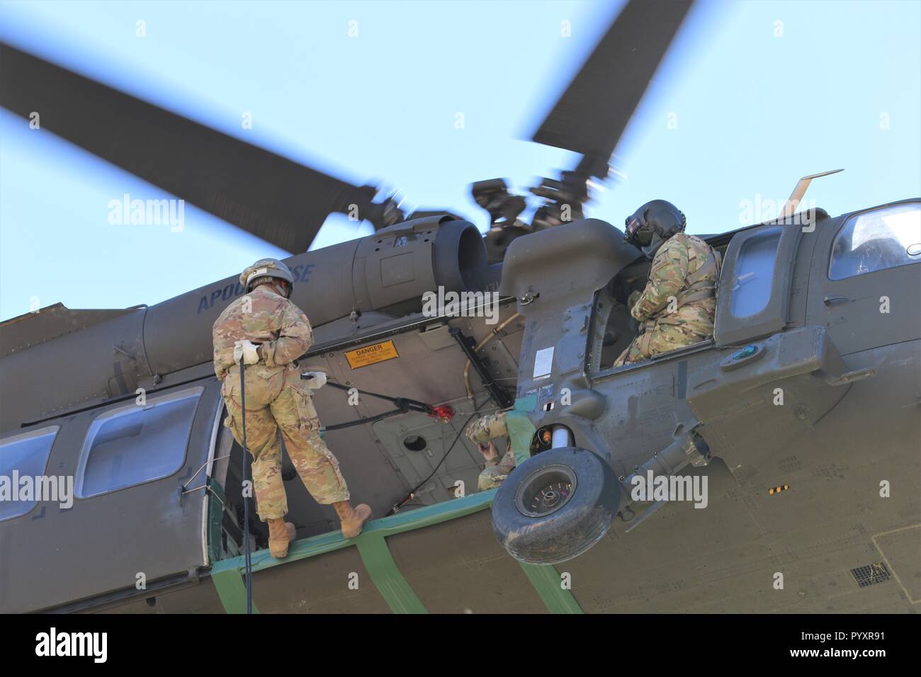 A Soldier prepares to rappel more than 90 feet from a UH-60 Black Hawk ...