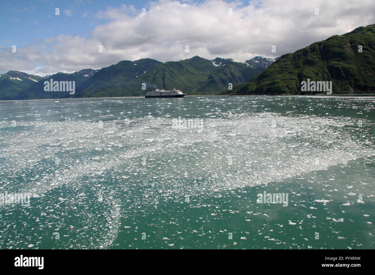 Cruise ship in Yakutat Bay, Alaska amidst glaciers, mountains and ...