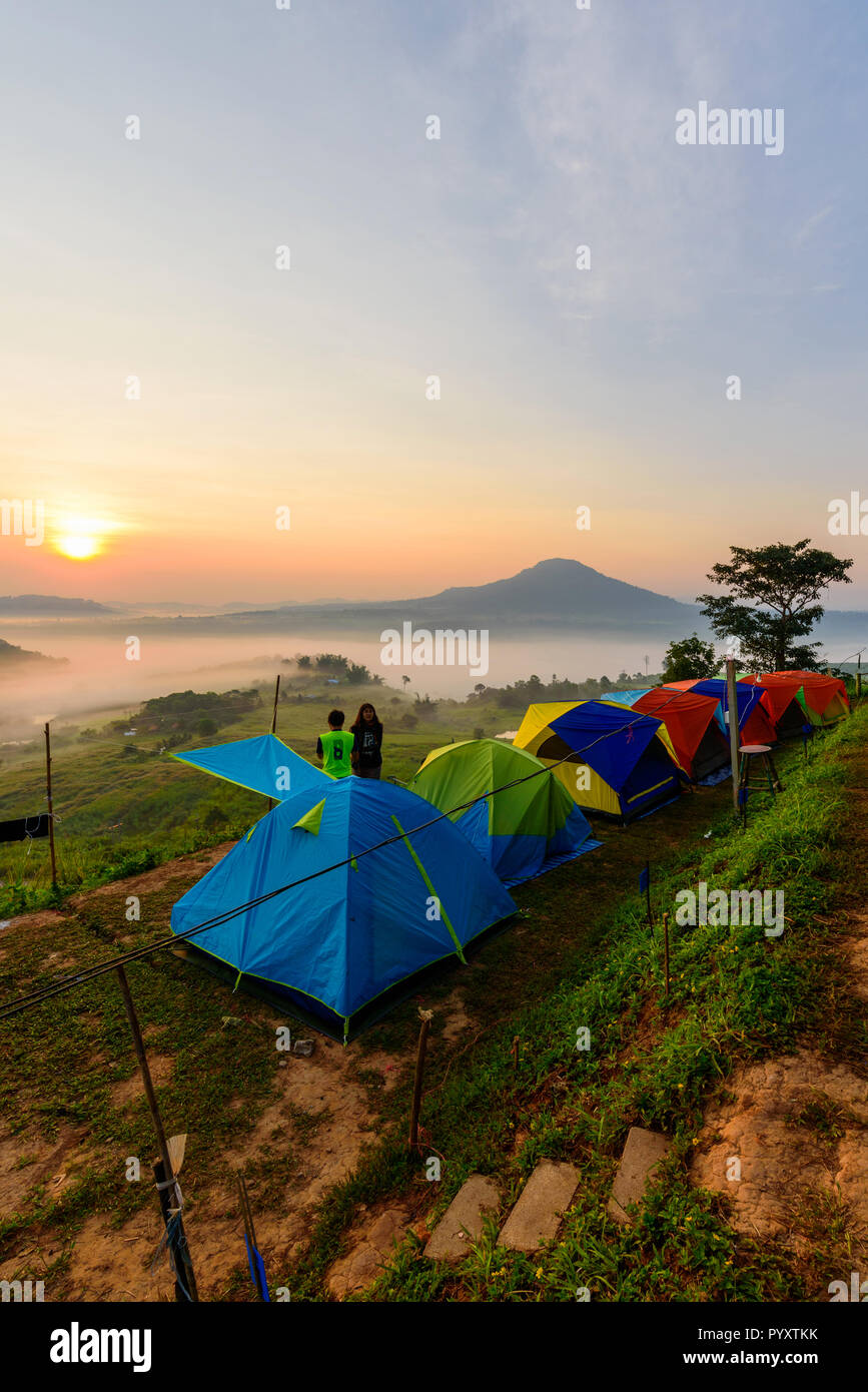 camping on high mountain with mist in sunrise time Stock Photo - Alamy