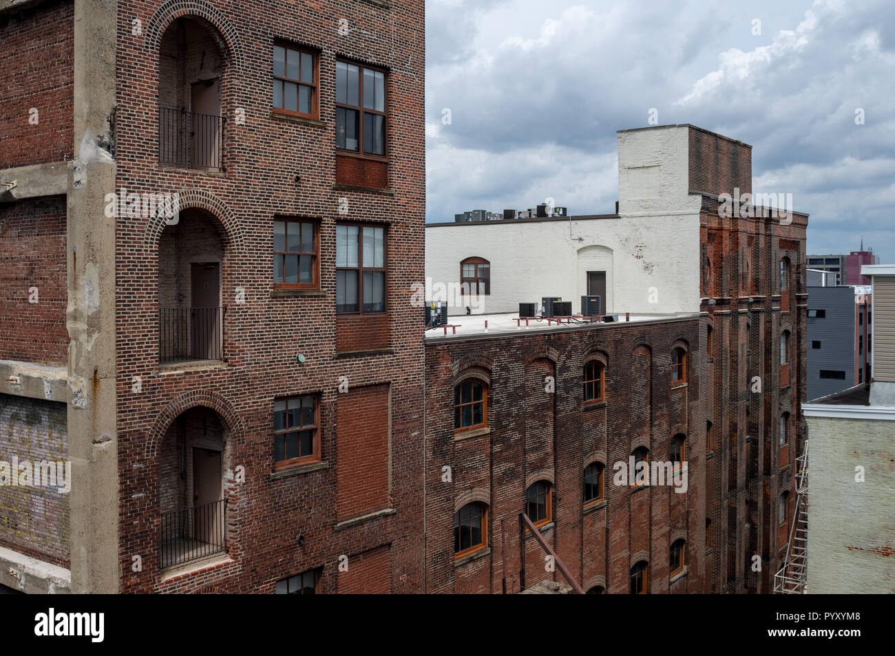 A close-up view of the brick buildings of a city Stock Photo - Alamy