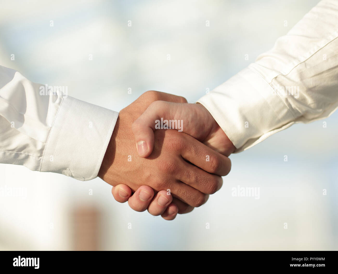 Close-up photo of handshake of two successful businessmen Stock Photo ... Close-up photo of handshake of two successful businessmen Stock Photo ...