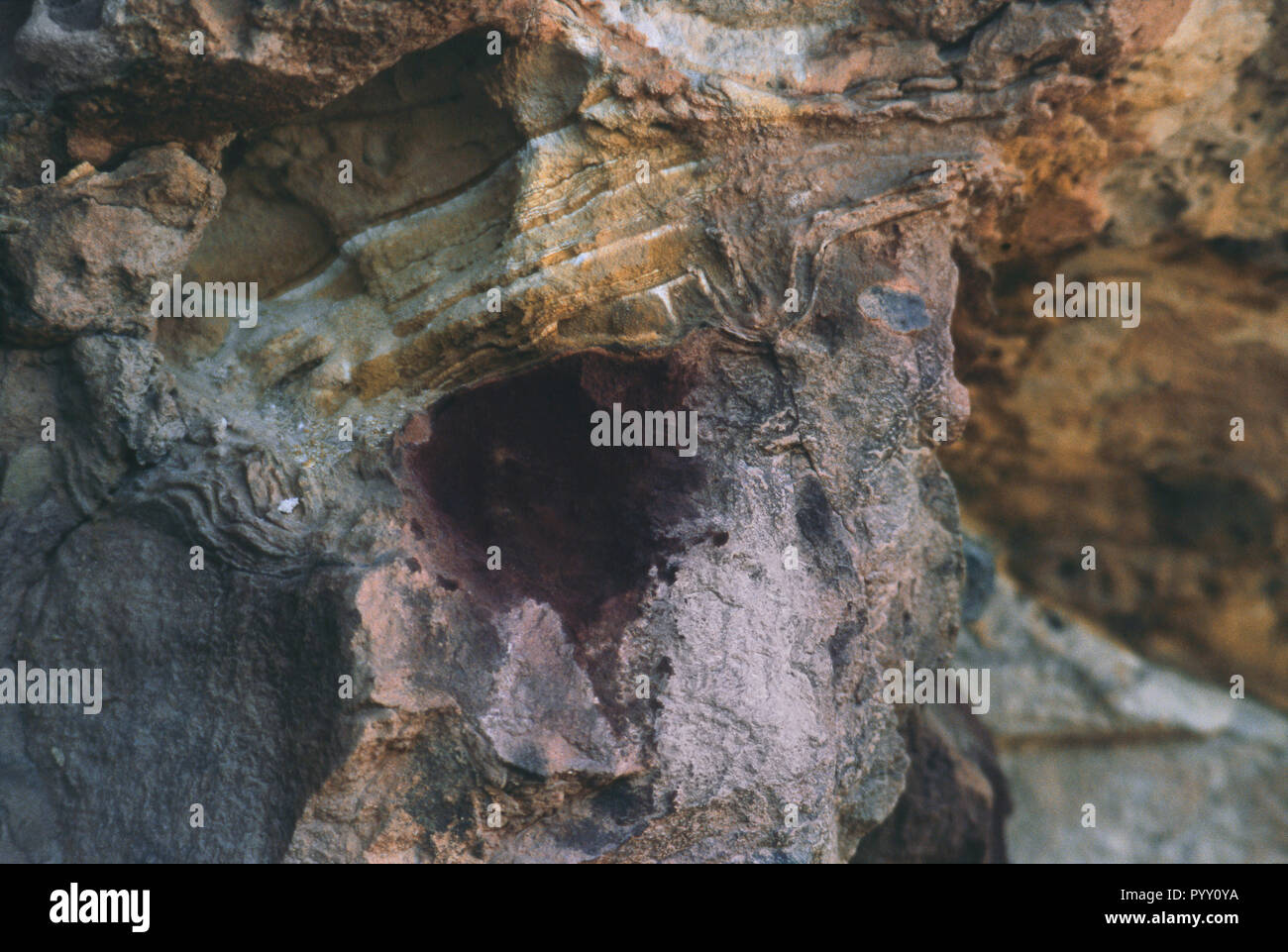 Naturally occurring iron compound used by Indians for red face paint ...