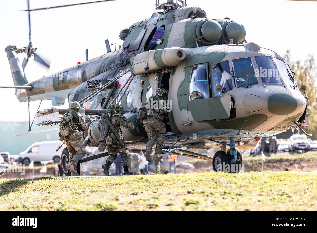 soldiers landing at the military helicopter and special forces ...