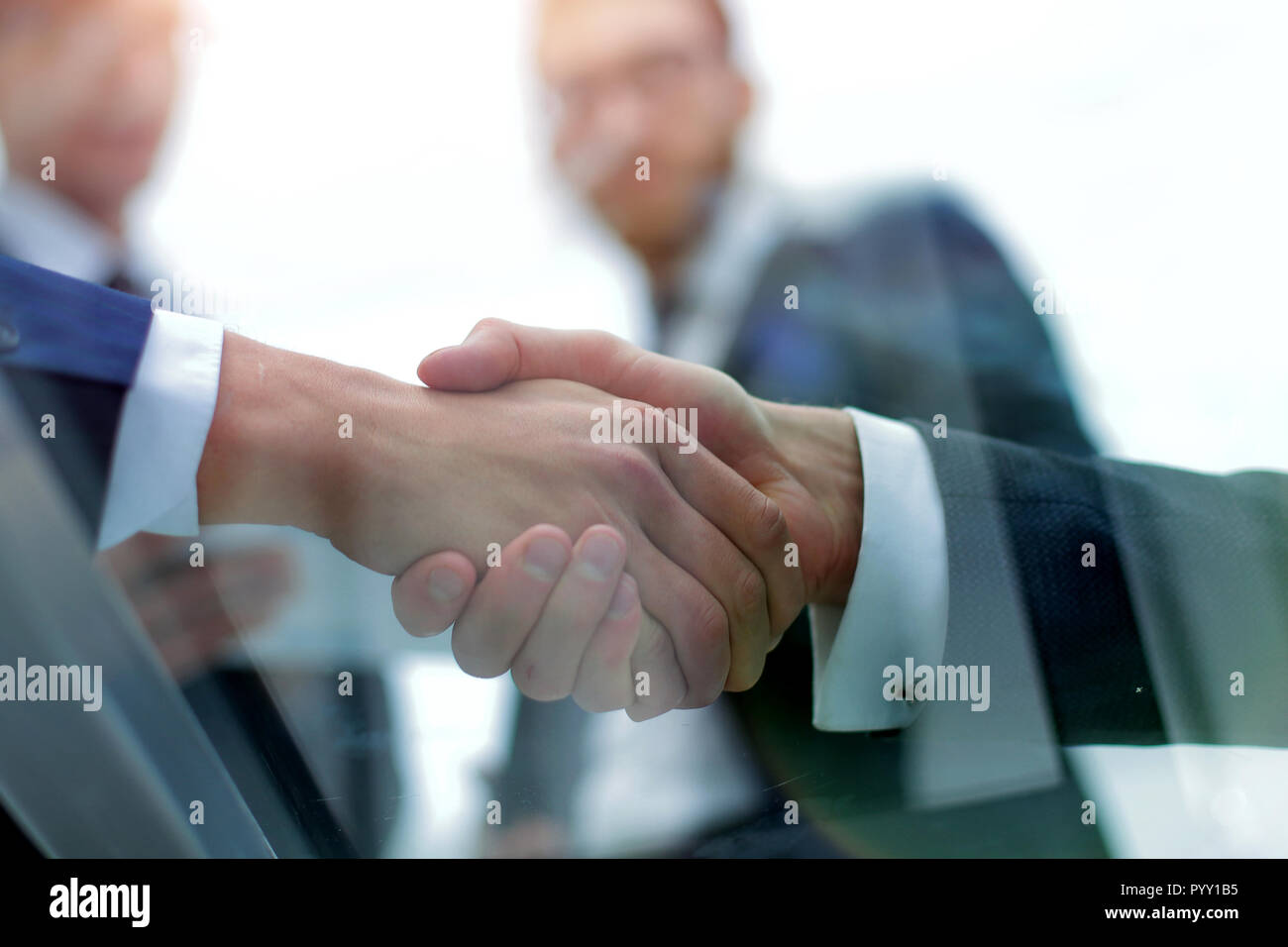 Woman signing document shaking hands hi-res stock photography and ...