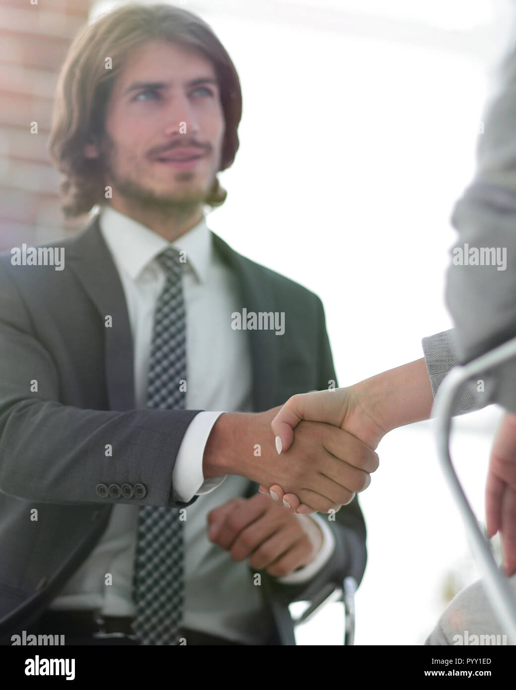 Successful job interview with boss and employee handshaking Stock Photo ...