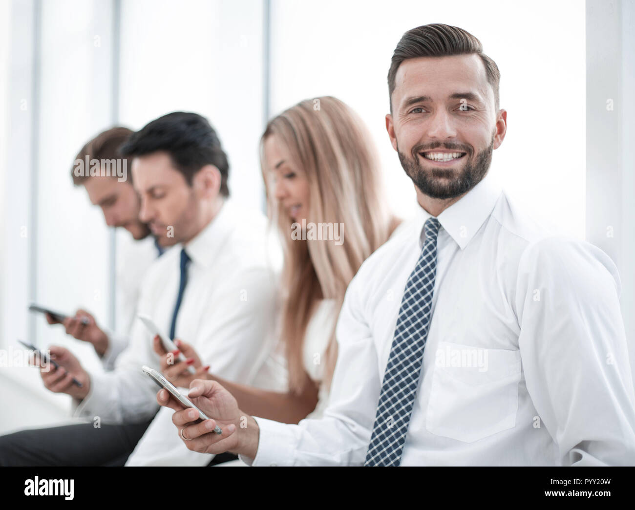 Manager and his colleagues are sitting in the office waiting roo Stock ...