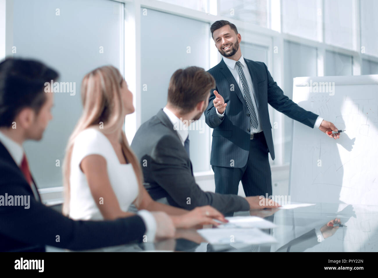 boss, explaining business to the team the company's new strategy Stock ...