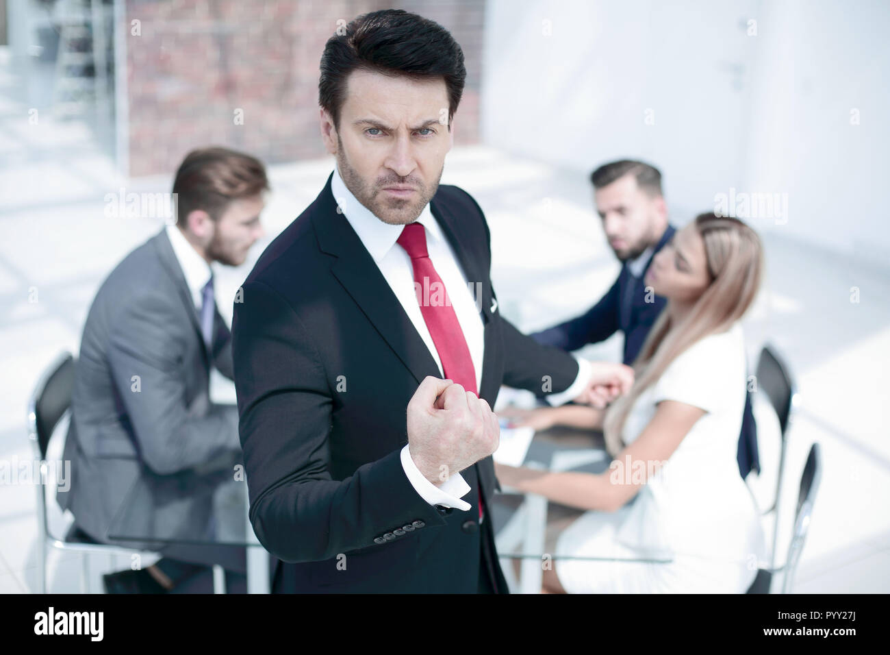 strict boss standing in the office Stock Photo - Alamy