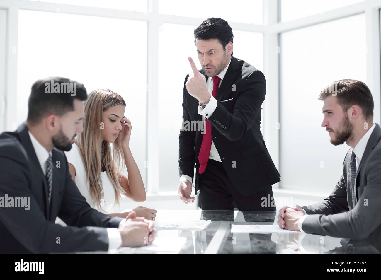 strict boss at a meeting with the business team Stock Photo - Alamy