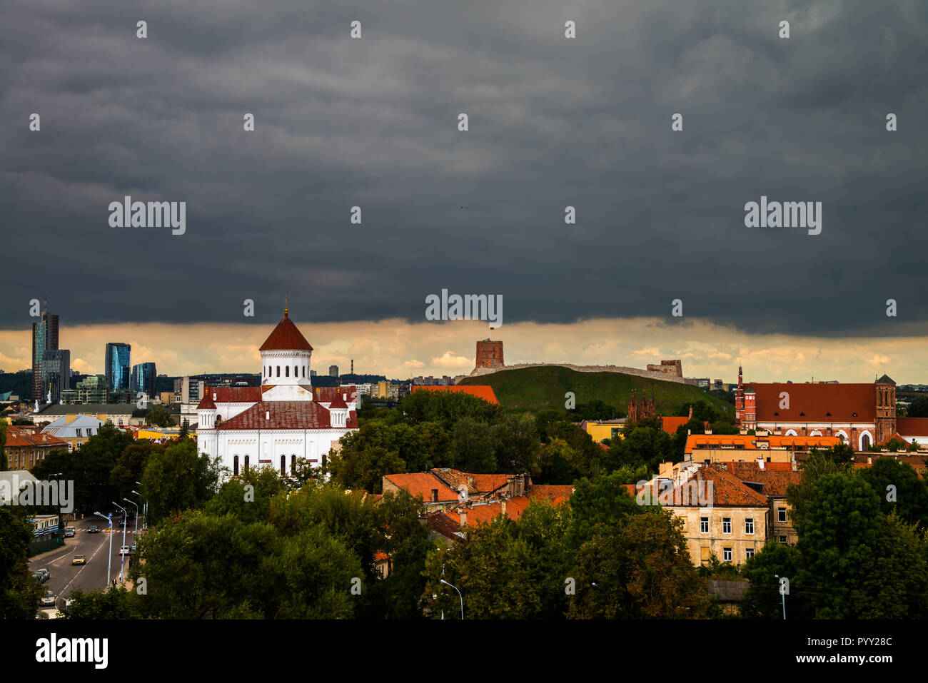 Heavy dark cloud over Vilnius, Lithuania. famous landmarks - cathedral ...