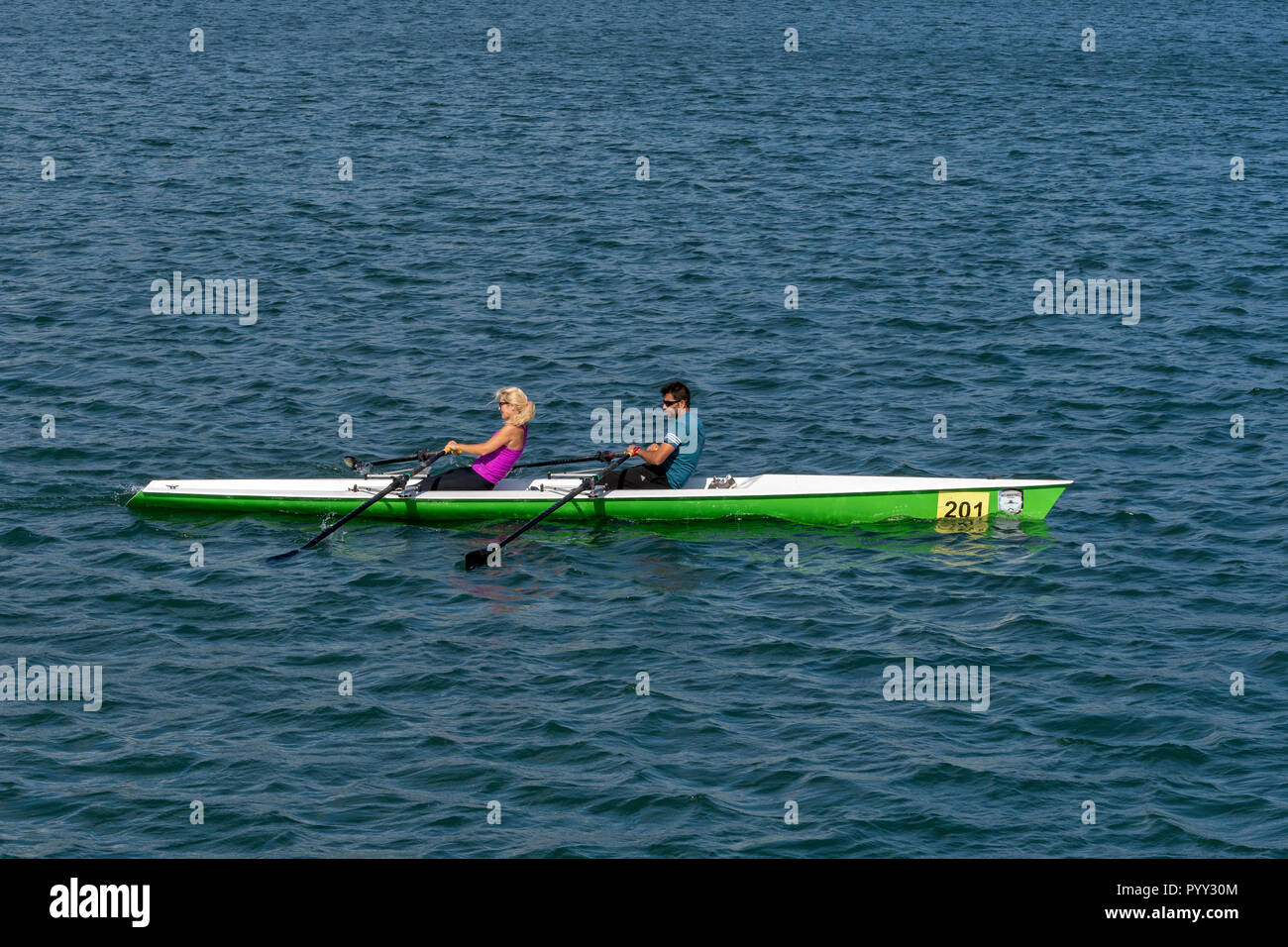 Two people rowing on Golden Horn in Istanbul,Turkey Stock Photo - Alamy