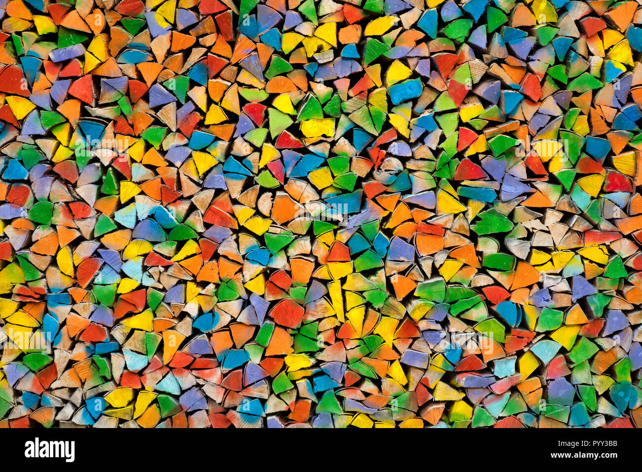 Colorful stacked logs, background image, Germany Stock Photo - Alamy