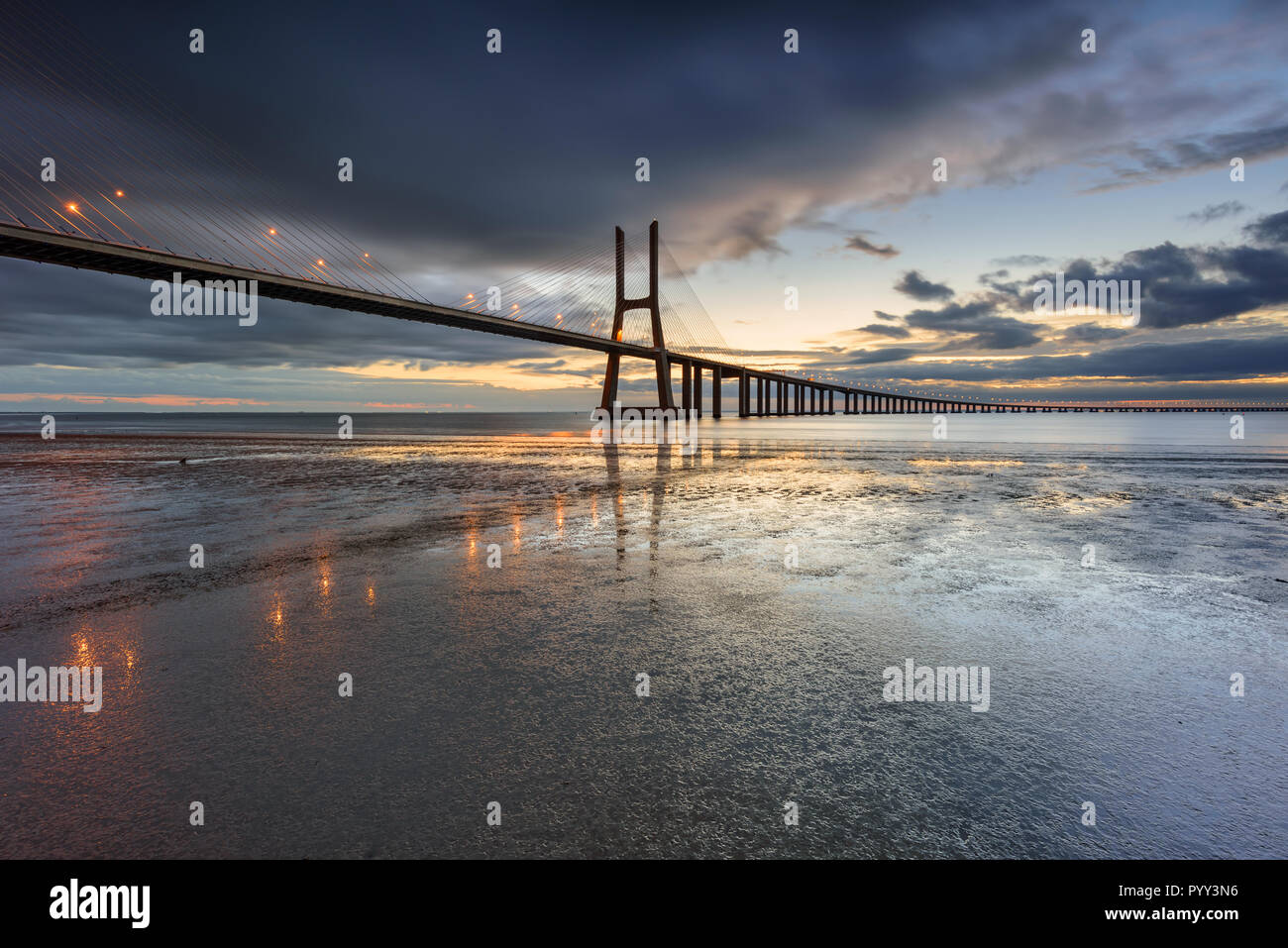 Vasco da Gama Bridge landscape at sunrise. One of the longest bridges ...