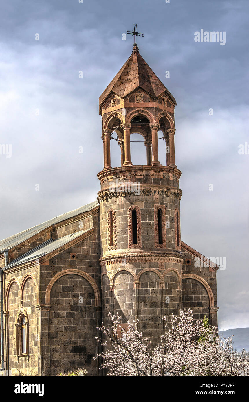Church of St.Mesrop Mashtots with a cylindrical bell tower among ...