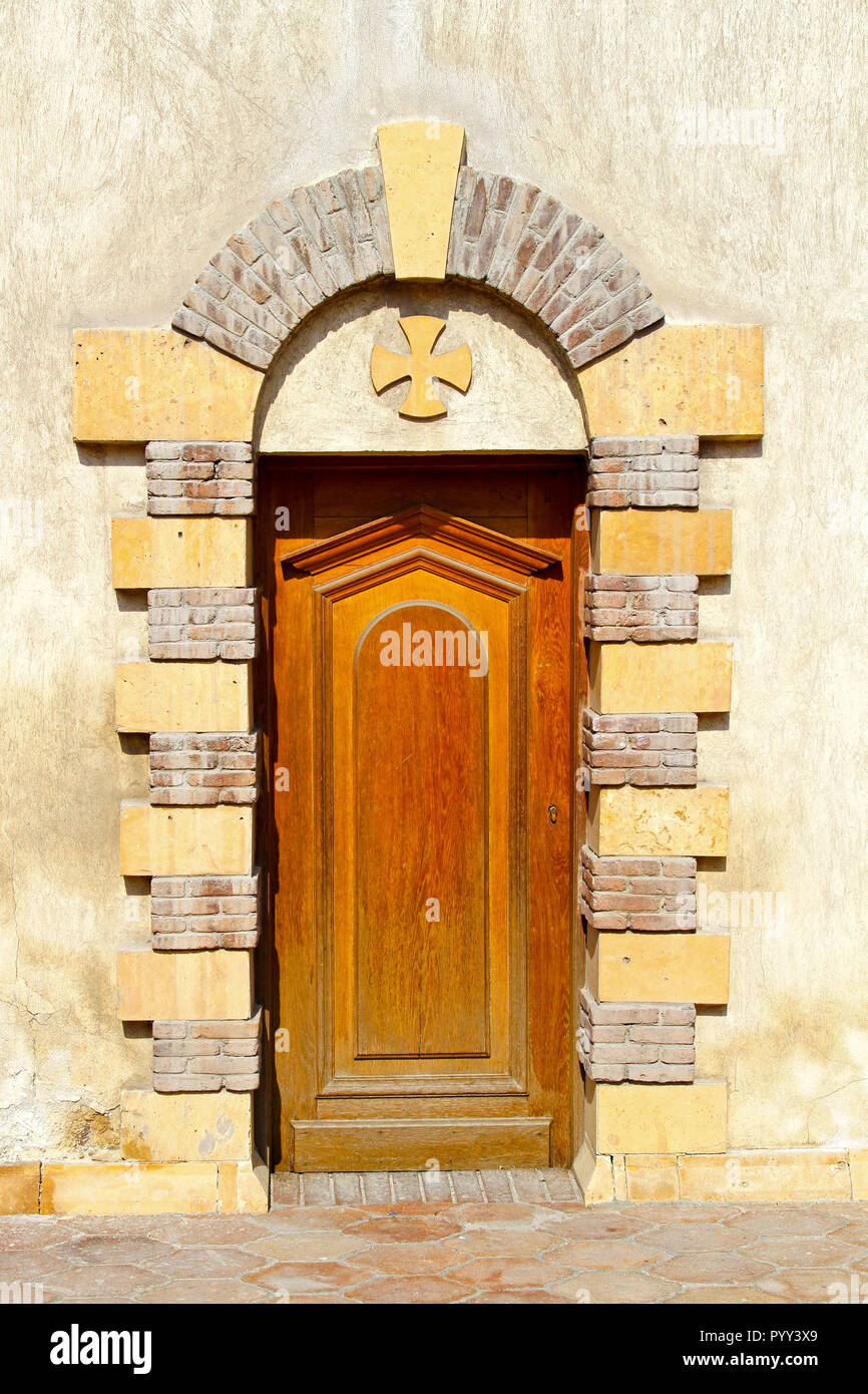 Small wooden door at church with cross Stock Photo - Alamy
